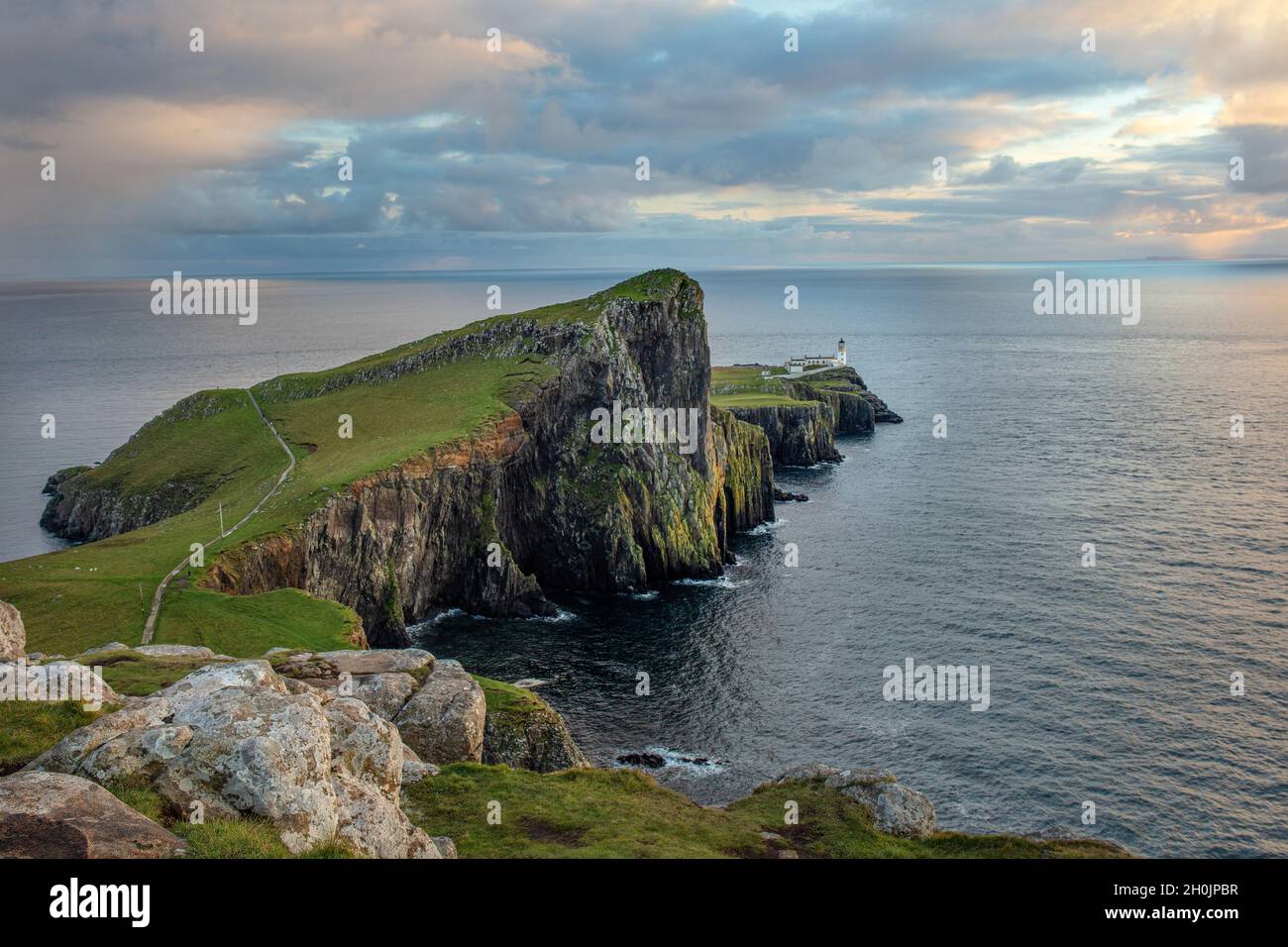 Sunset view of the Neist Point lighthouse, Isle of Skye, Scotland Stock ...