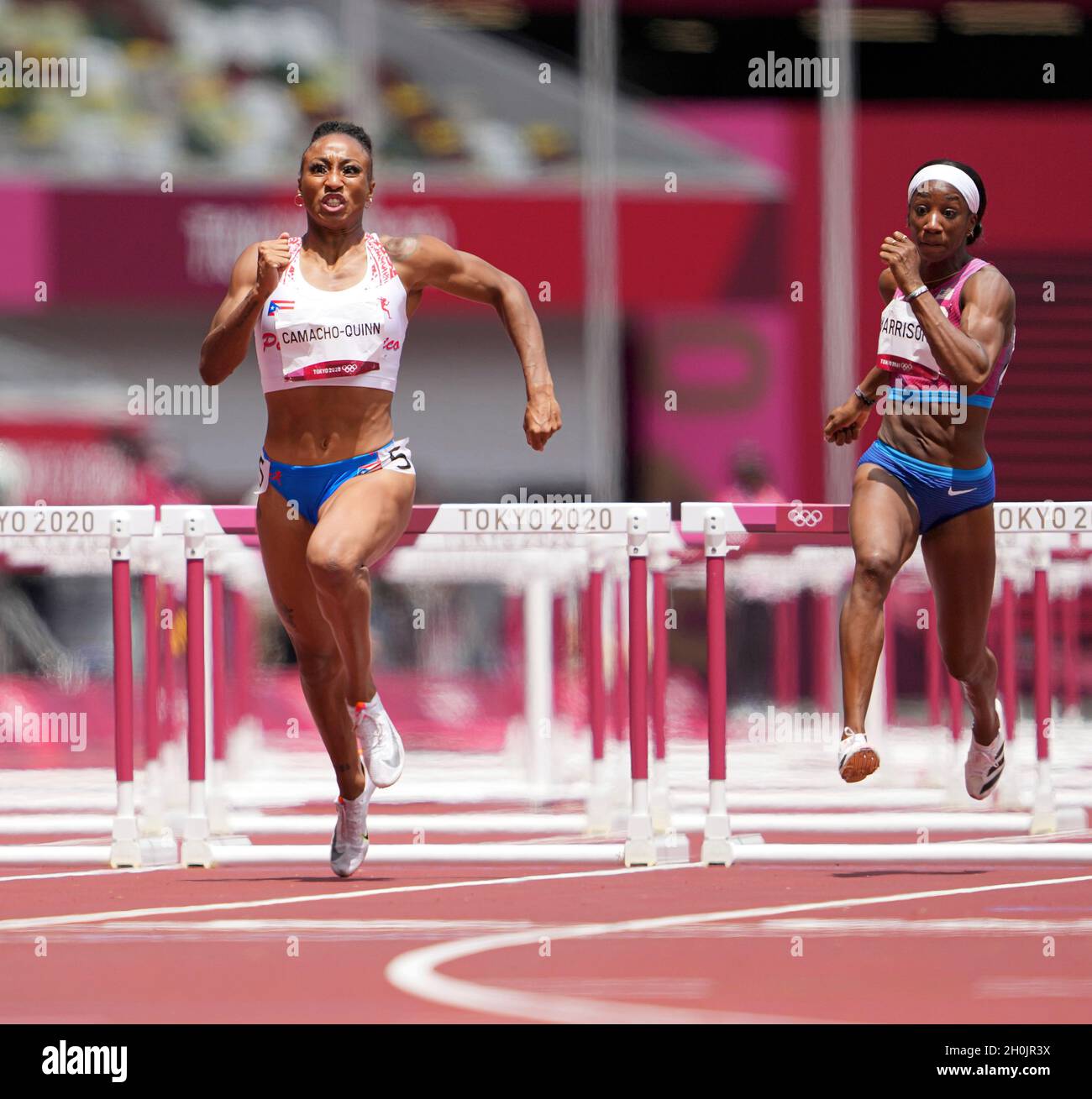 Jasmine Camacho-Quinn running and winning in the final of the 100 meter ...