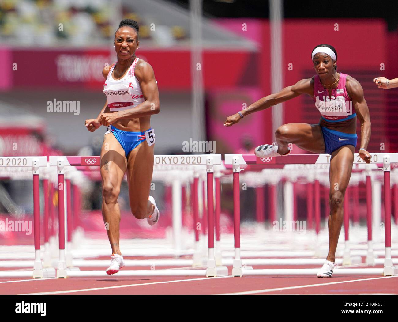Jasmine Camacho-Quinn running and winning in the final of the 100 meter ...