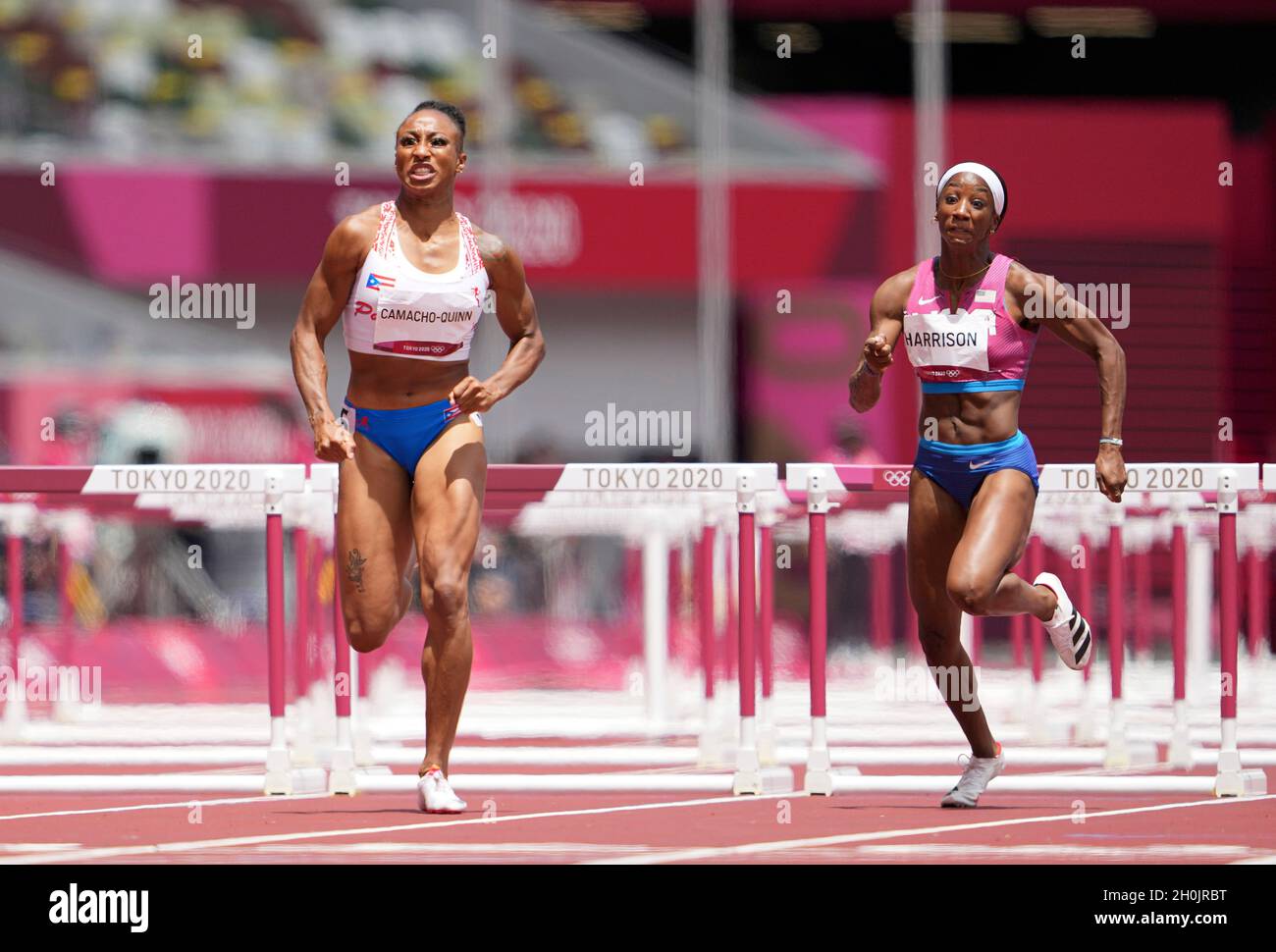 Jasmine Camacho-Quinn running and winning in the final of the 100 meter ...