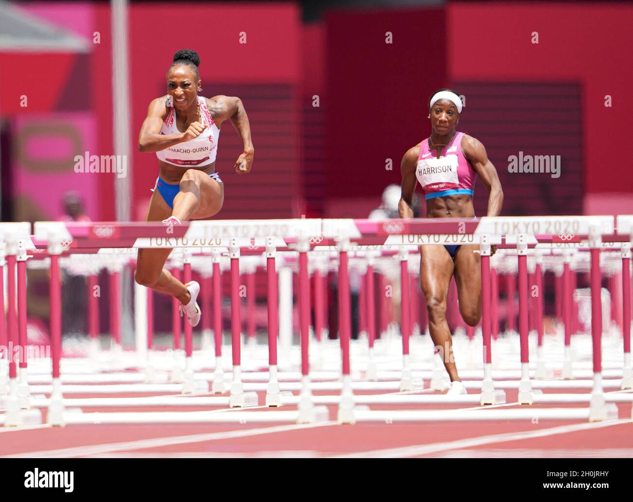 Jasmine Camacho-Quinn running and winning in the final of the 100 meter ...