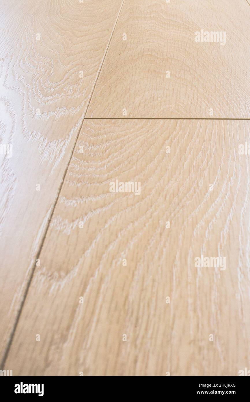 The connection of the laminate with a four-sided shaped chamfer - close ...