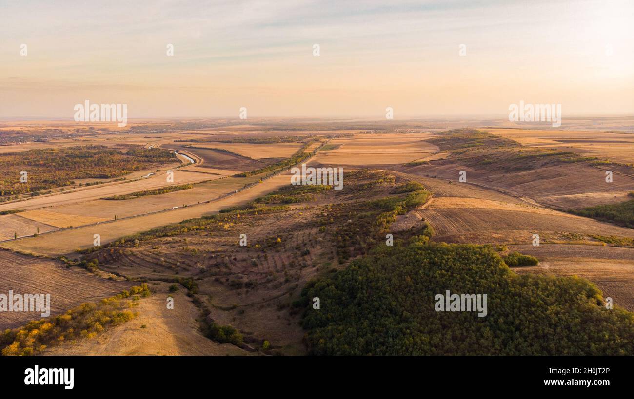 Aerial drone landscape over the hill by the sunset Stock Photo - Alamy