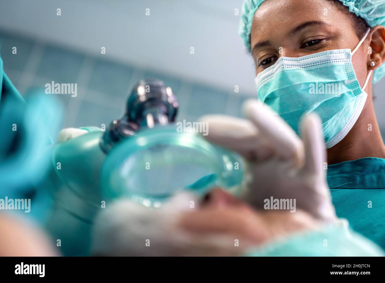 Anesthesiologist doctor anesthetized a surgical patient in hospital ...