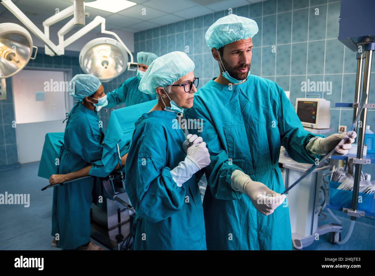 Doctors preparation for surgical operation in hospital. Healthcare ...