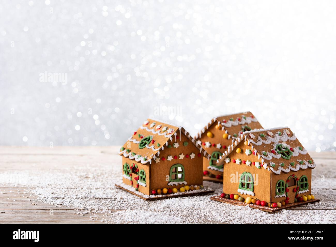 Christmas gingerbread house on glitter background Stock Photo - Alamy
