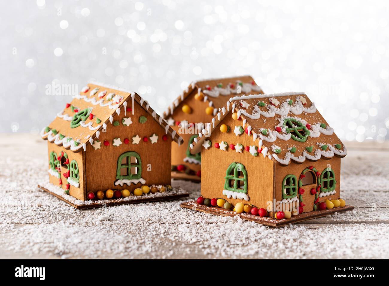 Christmas gingerbread house on glitter background Stock Photo - Alamy