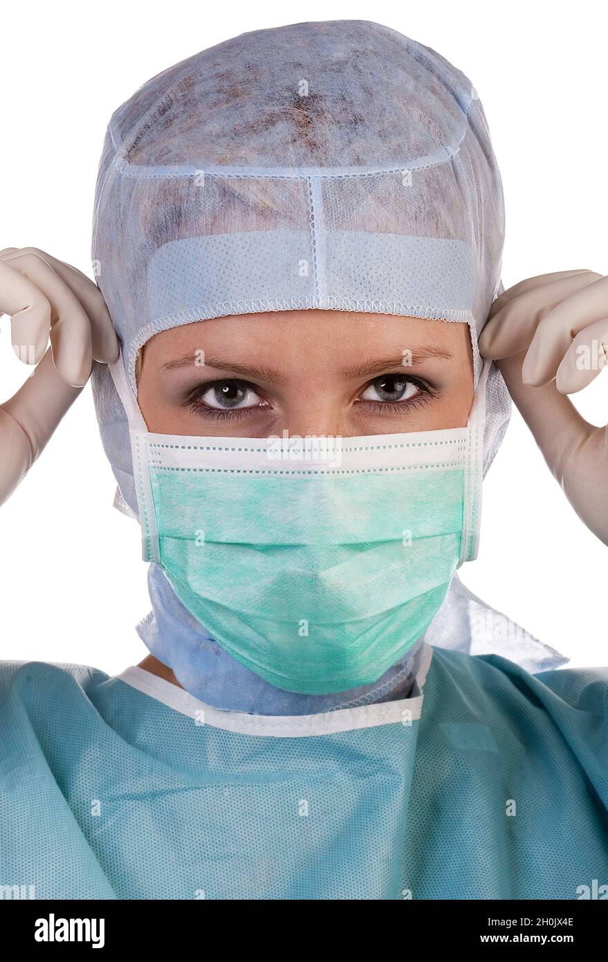 young operating room nurse with surgical mask and nurses cap Stock ...