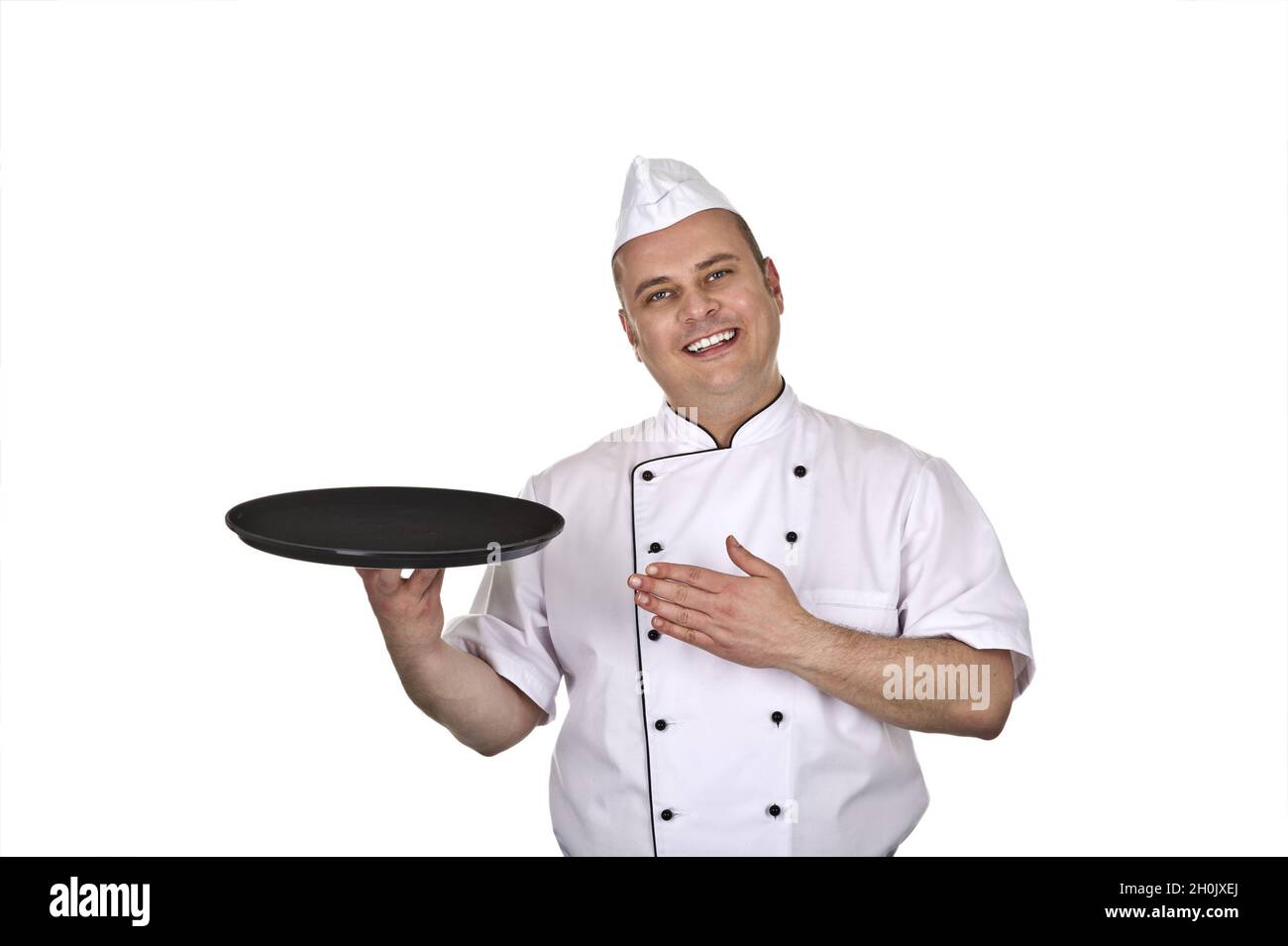 cook serving with a dinner tray Stock Photo - Alamy