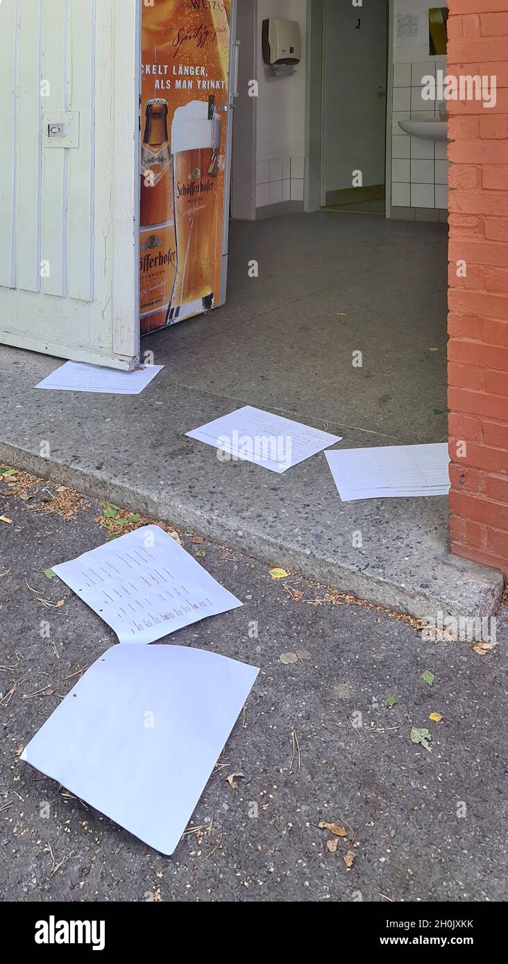 discarded sheets of paper in the toilet entrance Stock Photo - Alamy