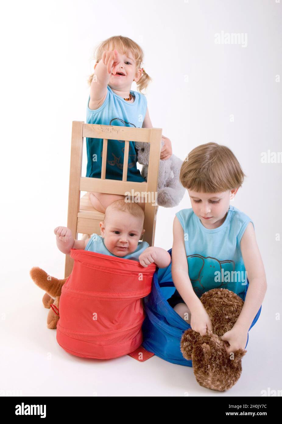 three siblings playing together Stock Photo - Alamy