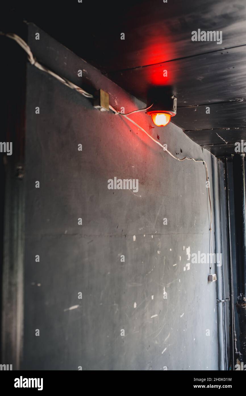 Emergency alarm - red light on the ceiling at the emergency exit ...