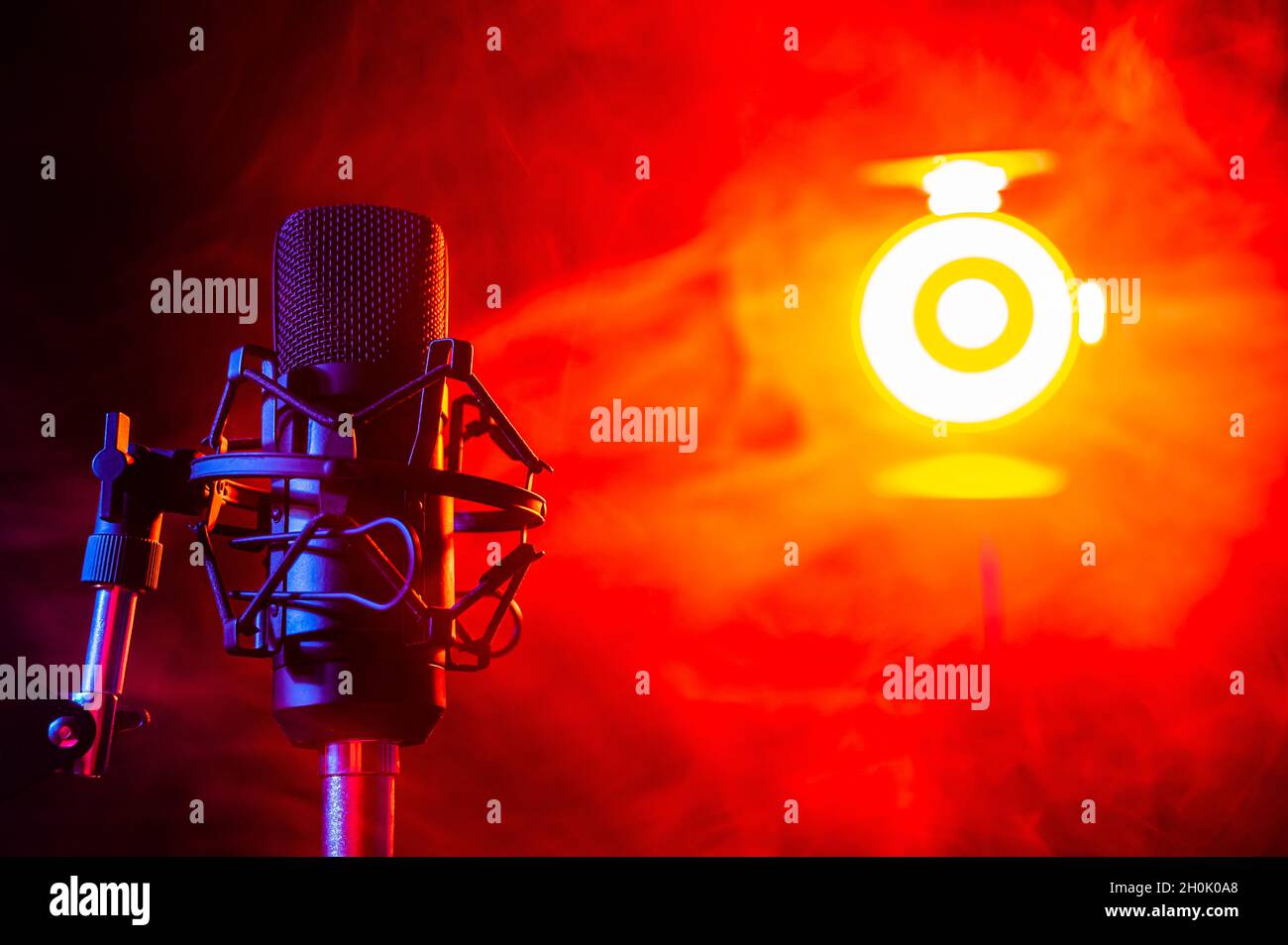 Professional microphone in red smoke on a black background Stock Photo ...