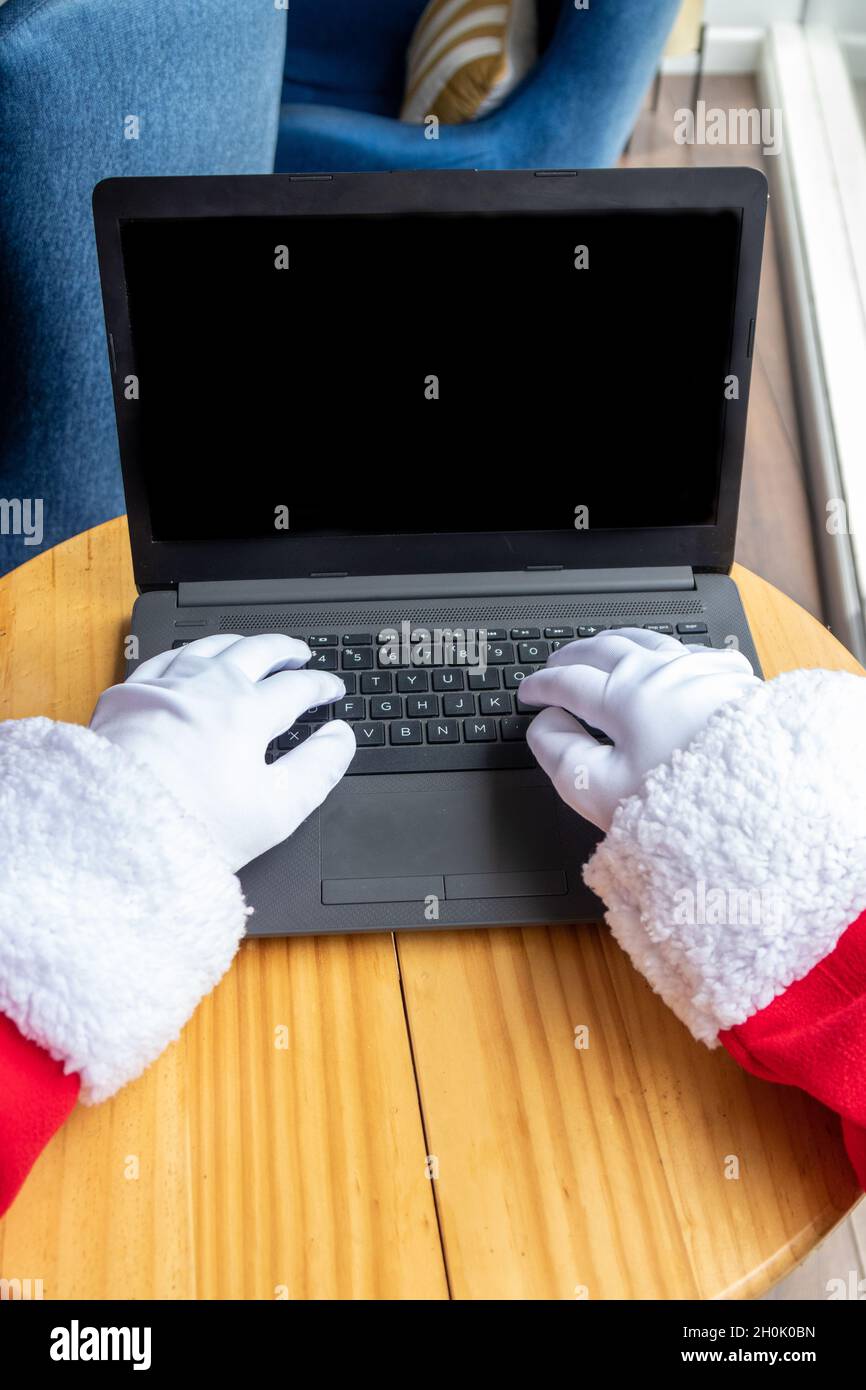 Typing santa claus hi-res stock photography and images - Alamy