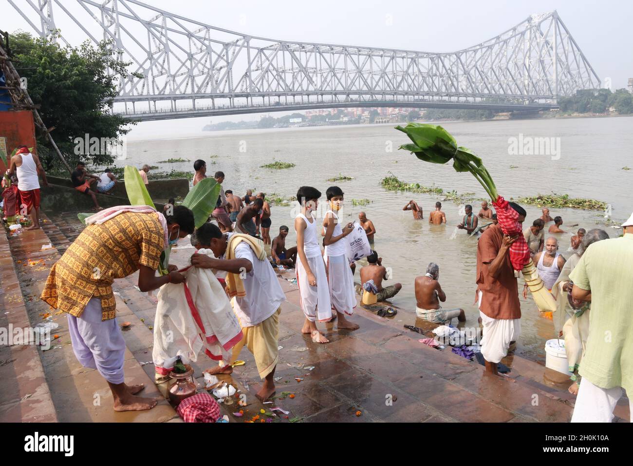 Kolkata, India. 12th Oct, 2021. Indian Hindu holy men or sadhus perform ...