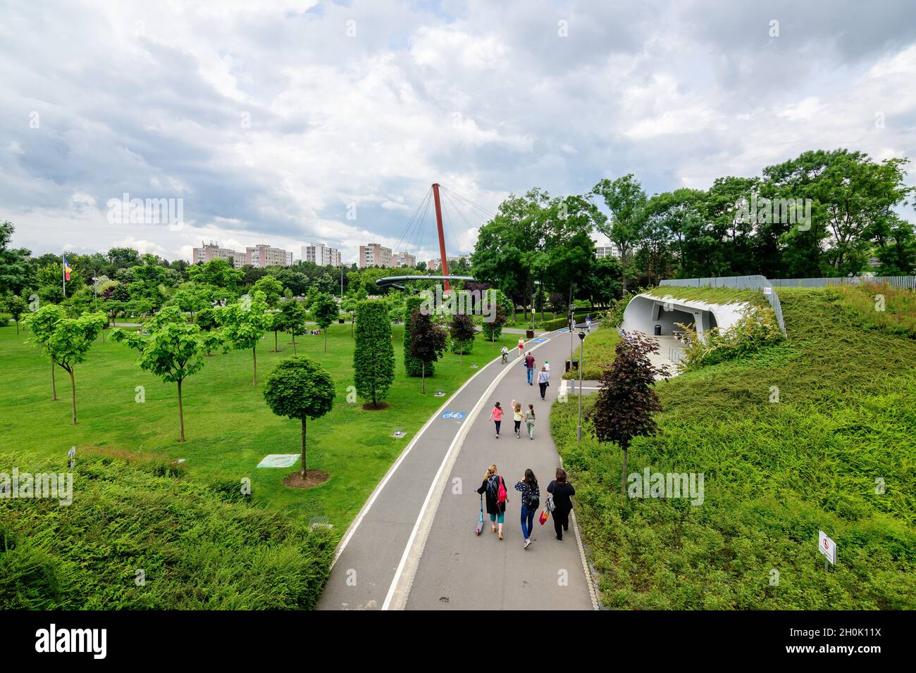 Bucharest, Romania - 29 May 2021: Landscape with alley and vivid green ...