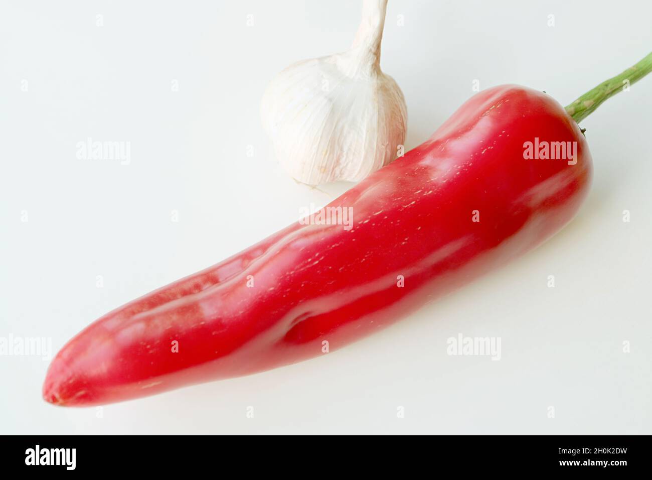 Fresh Ripe Red Georgia Flame Sweet Pepper with Garlic Isolated on White ...