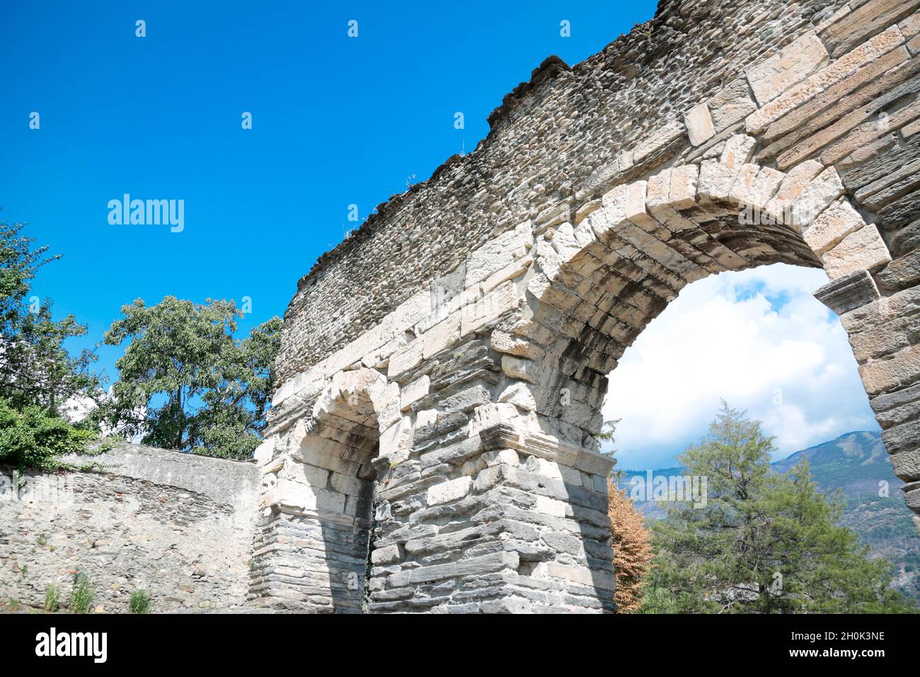 Susa, Segusium, with its historical arc of Augustus and roman ruins, in ...