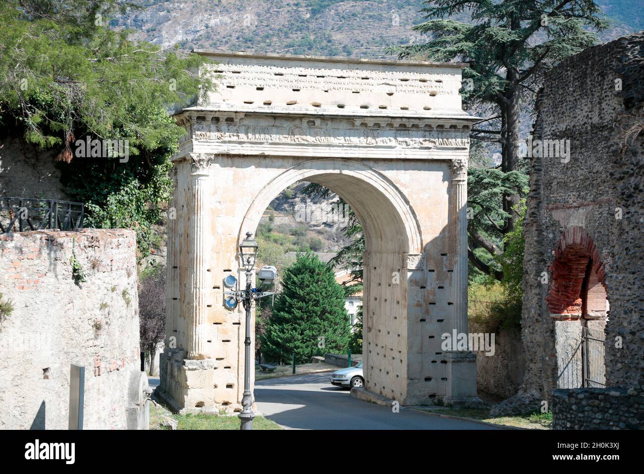 Susa, Segusium, with its historical arc of Augustus and roman ruins, in ...