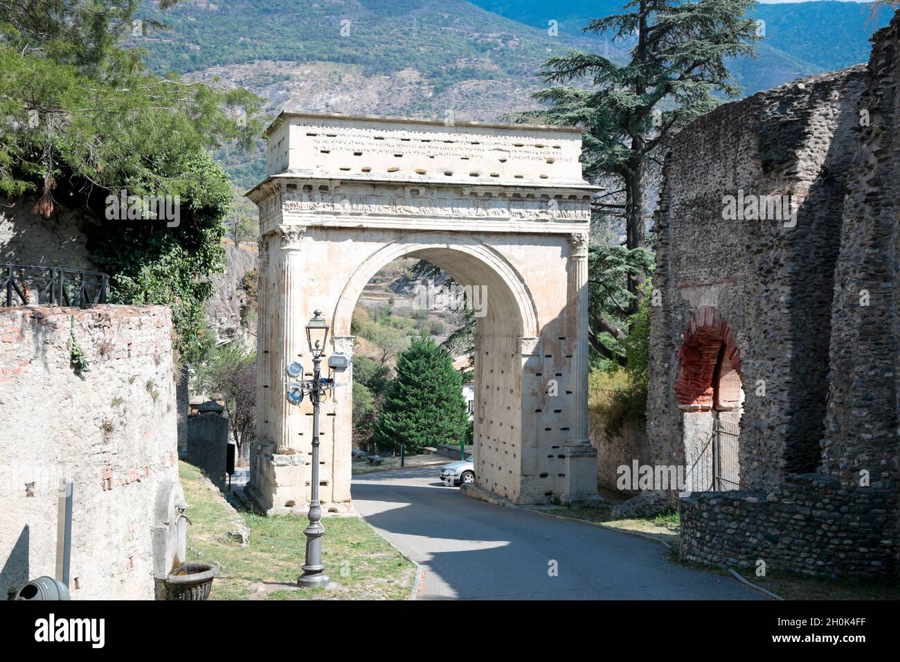 Susa, Segusium, with its historical arc of Augustus and roman ruins, in ...