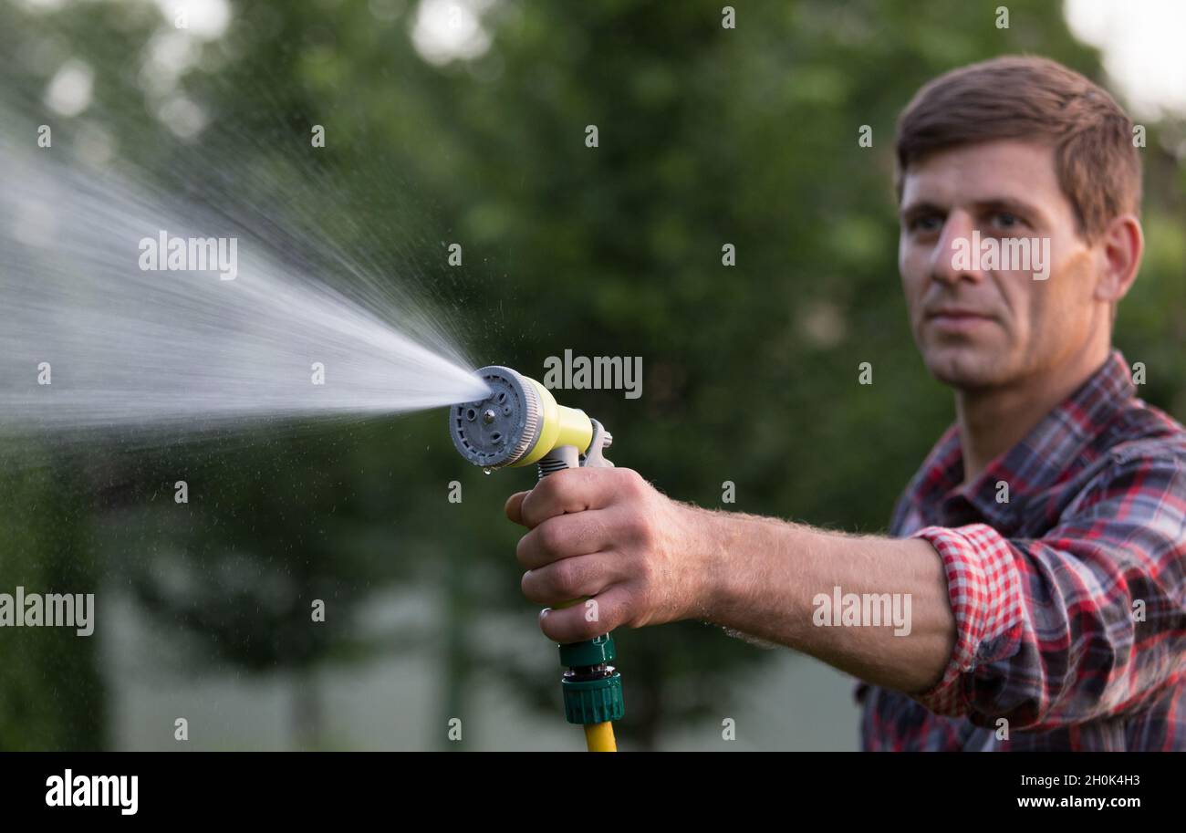 Hose spray face hi-res stock photography and images - Alamy