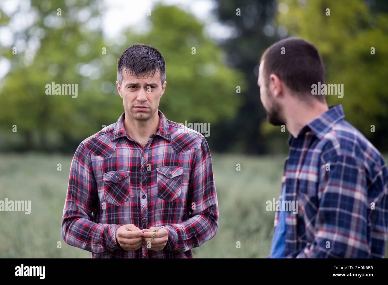 Two men farmer field hi-res stock photography and images - Alamy