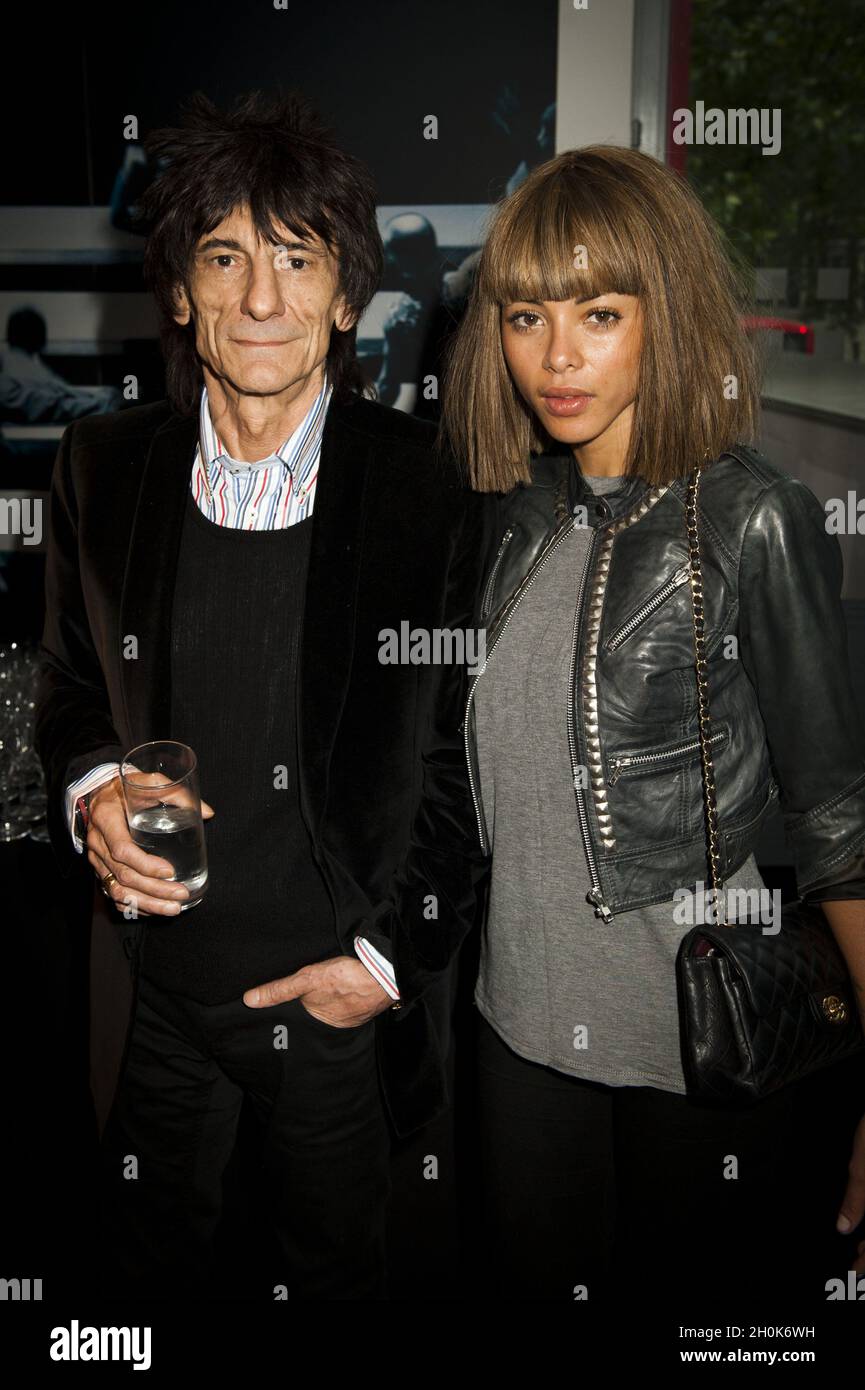 Ronnie Wood and girlfriend Ana Araujo attend the opening night of ...