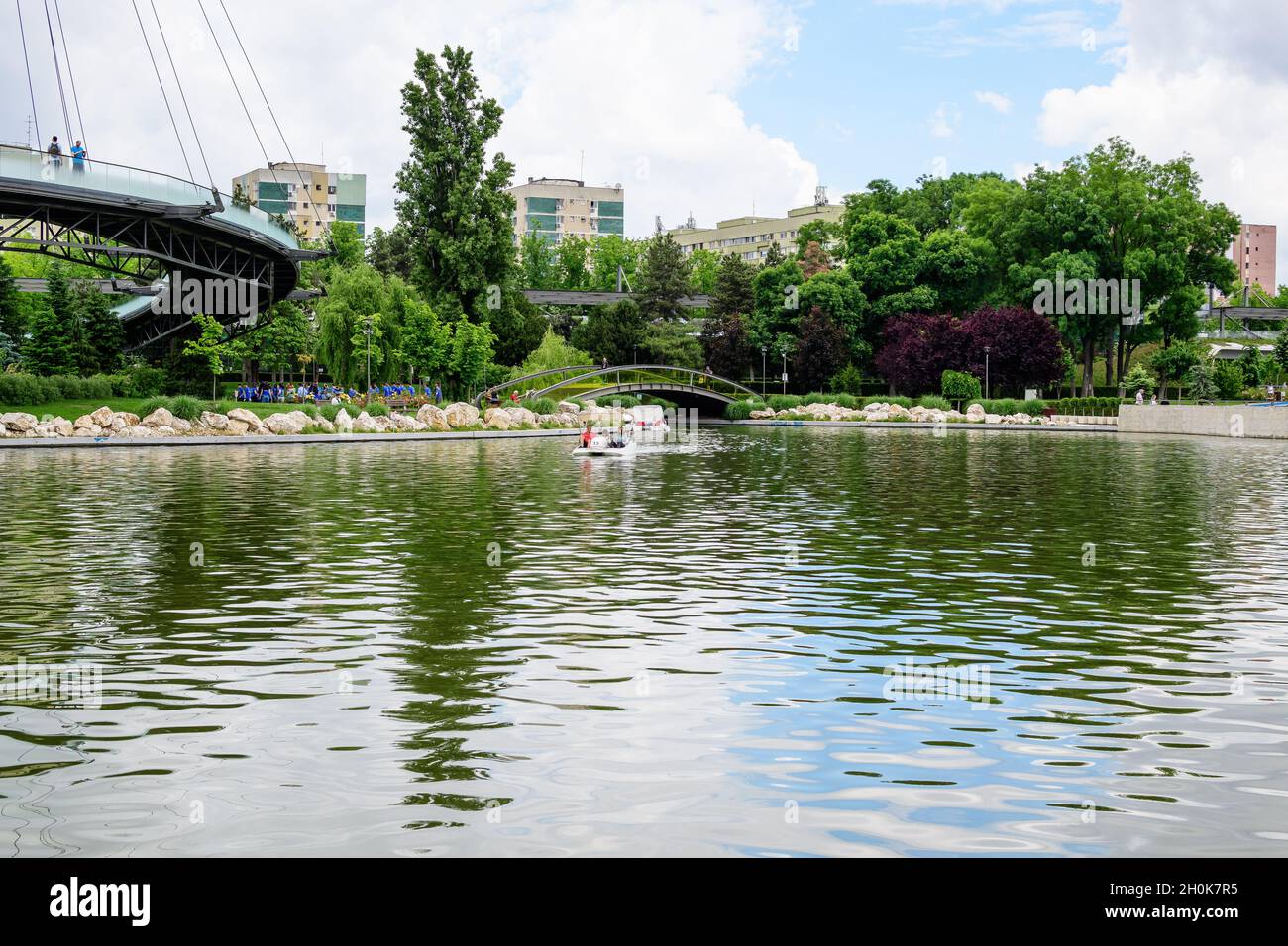 Bucharest, Romania - 29 May 2021: Landscape with lake and vivid green ...