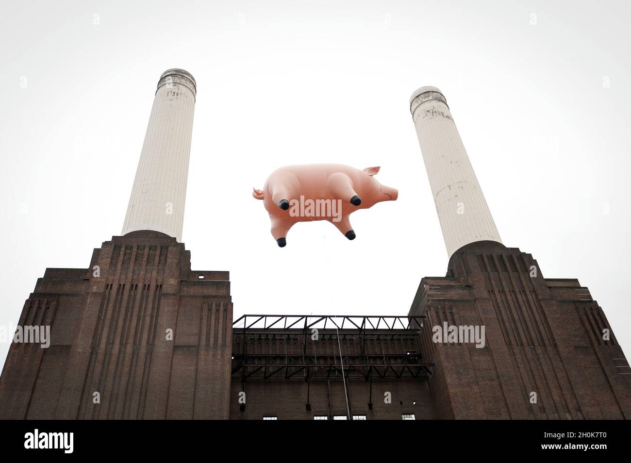 A giant inflatable pig flies above Battersea Power Station on the banks ...