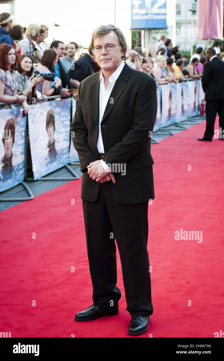 Nigel Sinclair arriving at the premiere of 'George Harrison: Living in ...