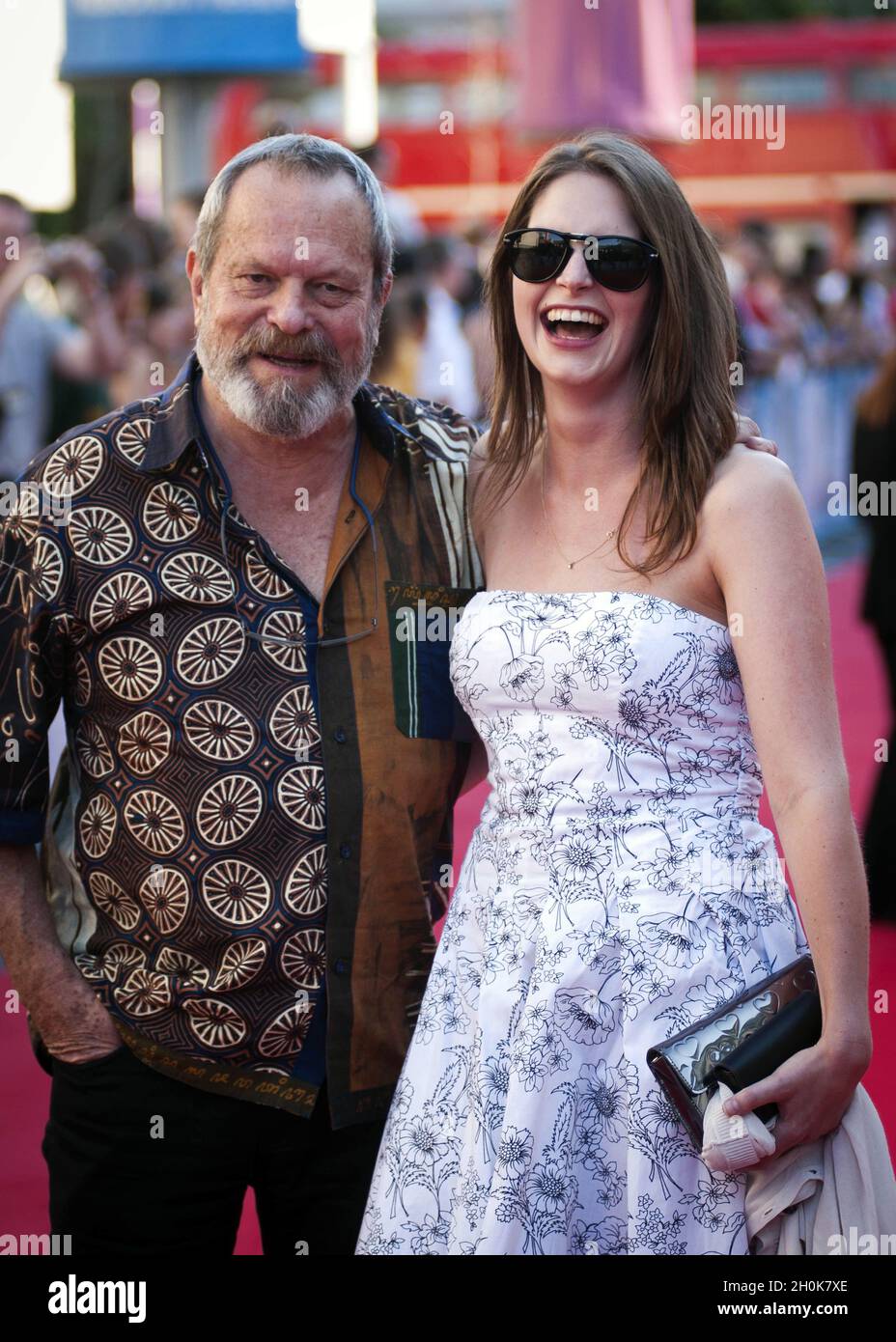 Terry Gilliam and guest arriving at the premiere of 'George Harrison ...