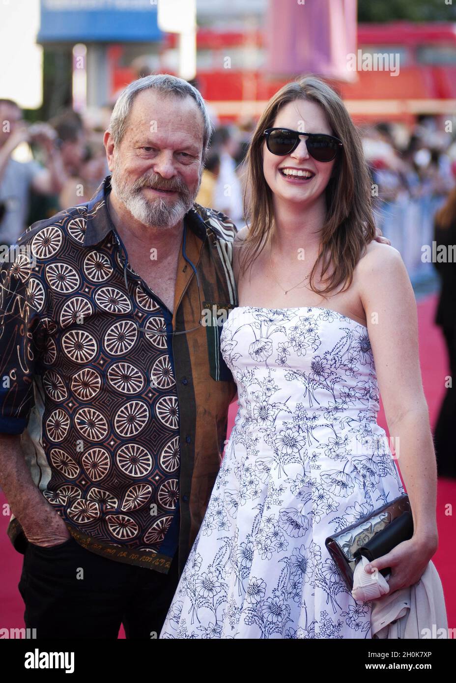 Terry Gilliam and guest arriving at the premiere of 'George Harrison ...
