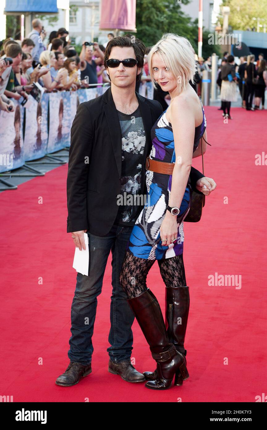 Kelly Jones and guest arriving at the premiere of 'George Harrison ...