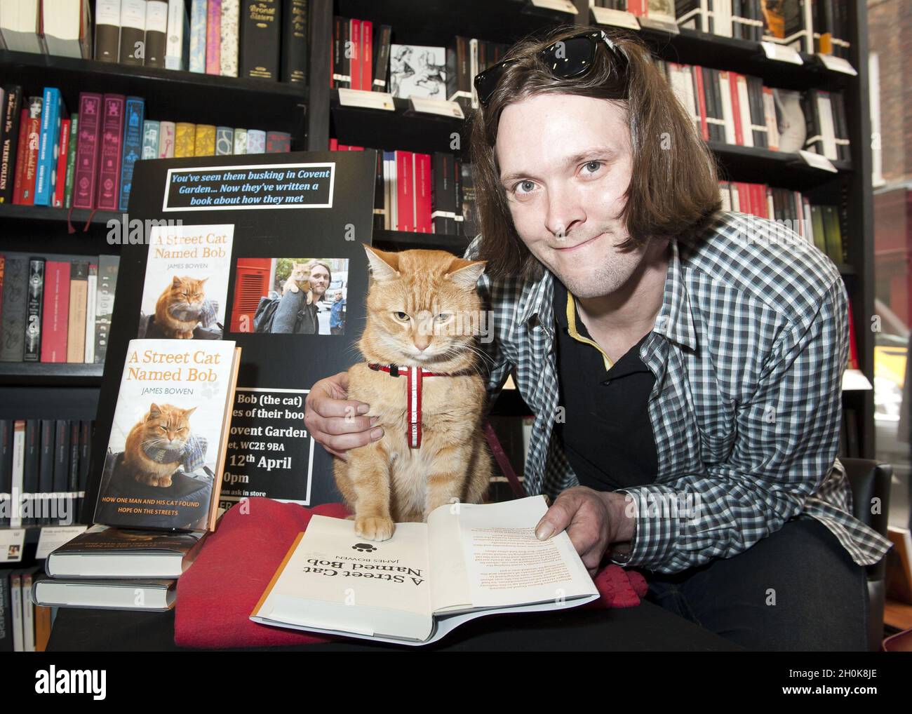 Bob the Street Cat and owner James Bowen sign copies of their book 'A ...