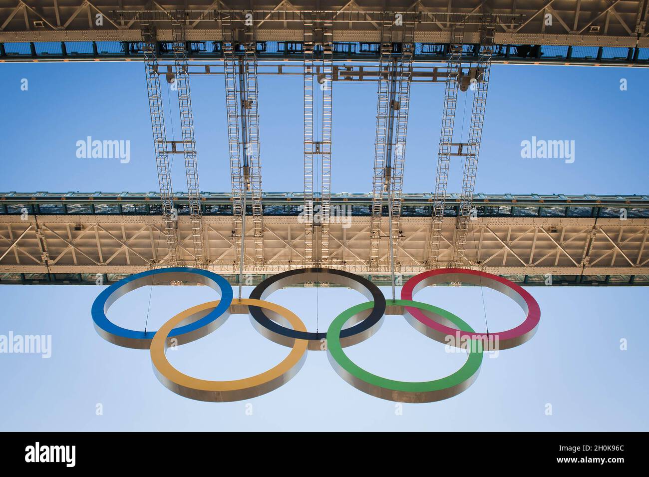 General View of the Olympic Rings hanging from Tower Bridge - London ...