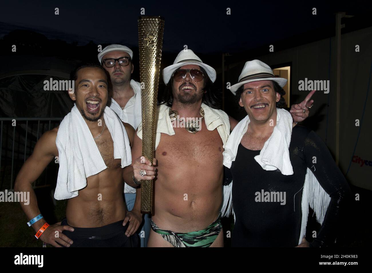 The Cuban Brothers with the Olympic Torch backstage at Camp Bestival ...