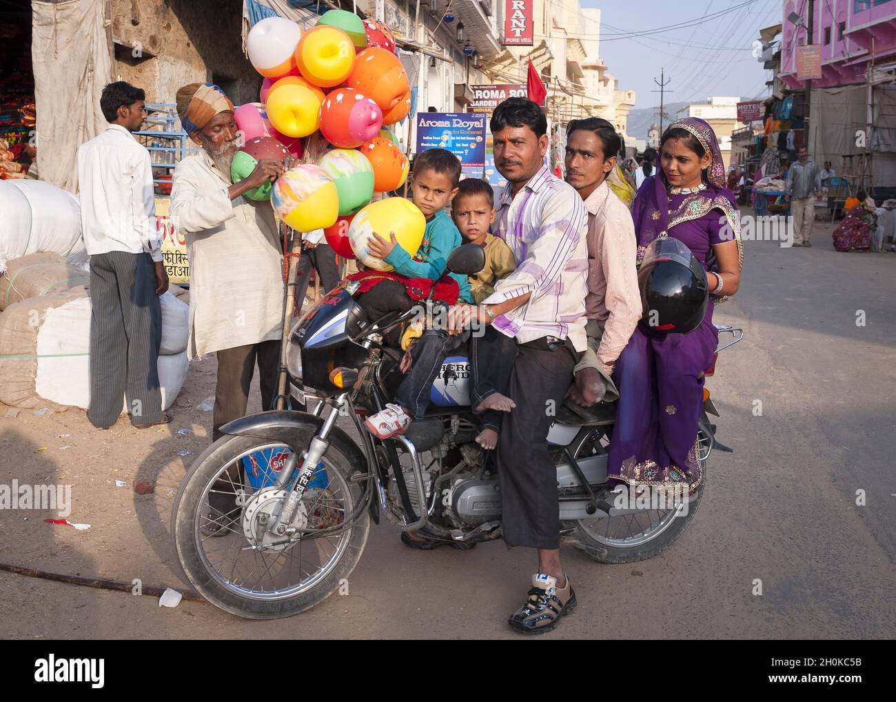 An Indian family riding a motorbike in Pushkar, India Stock Photo - Alamy