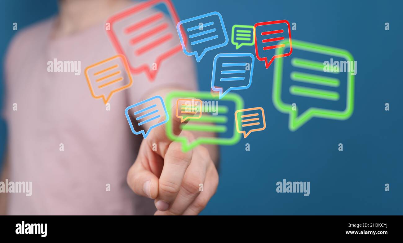 3D rendering of a businessman pointing at floating email icons against a dark blue background ...