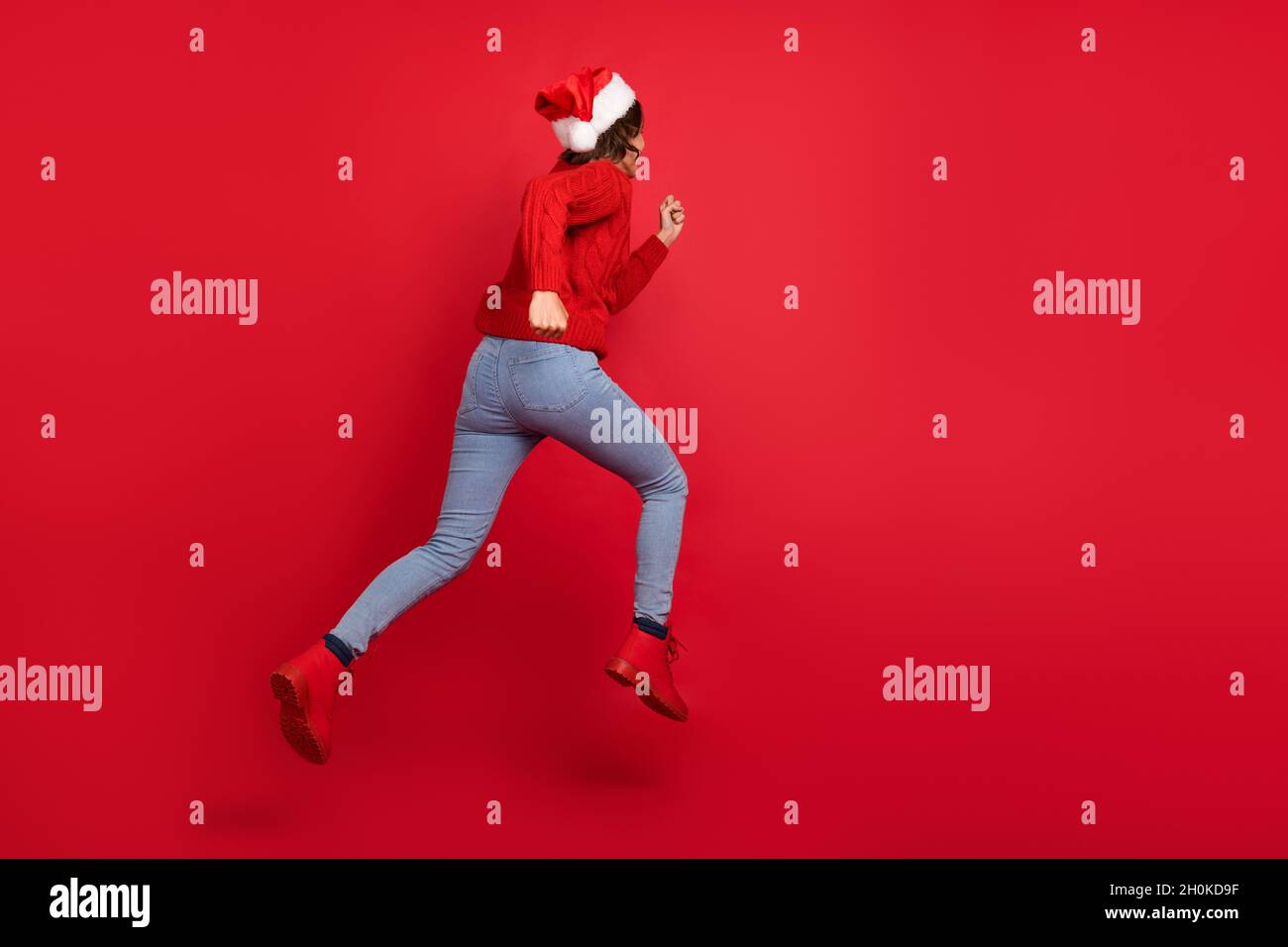 Back rear view full body photo of young girl jump up go run hurry fast ...