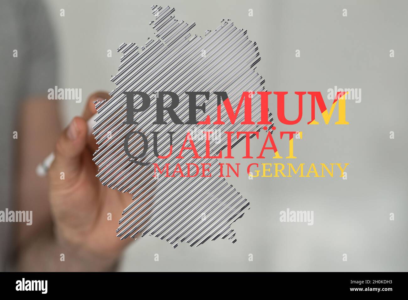 "Premium Quality, Made in Germany" written on a silhouette of the map ...