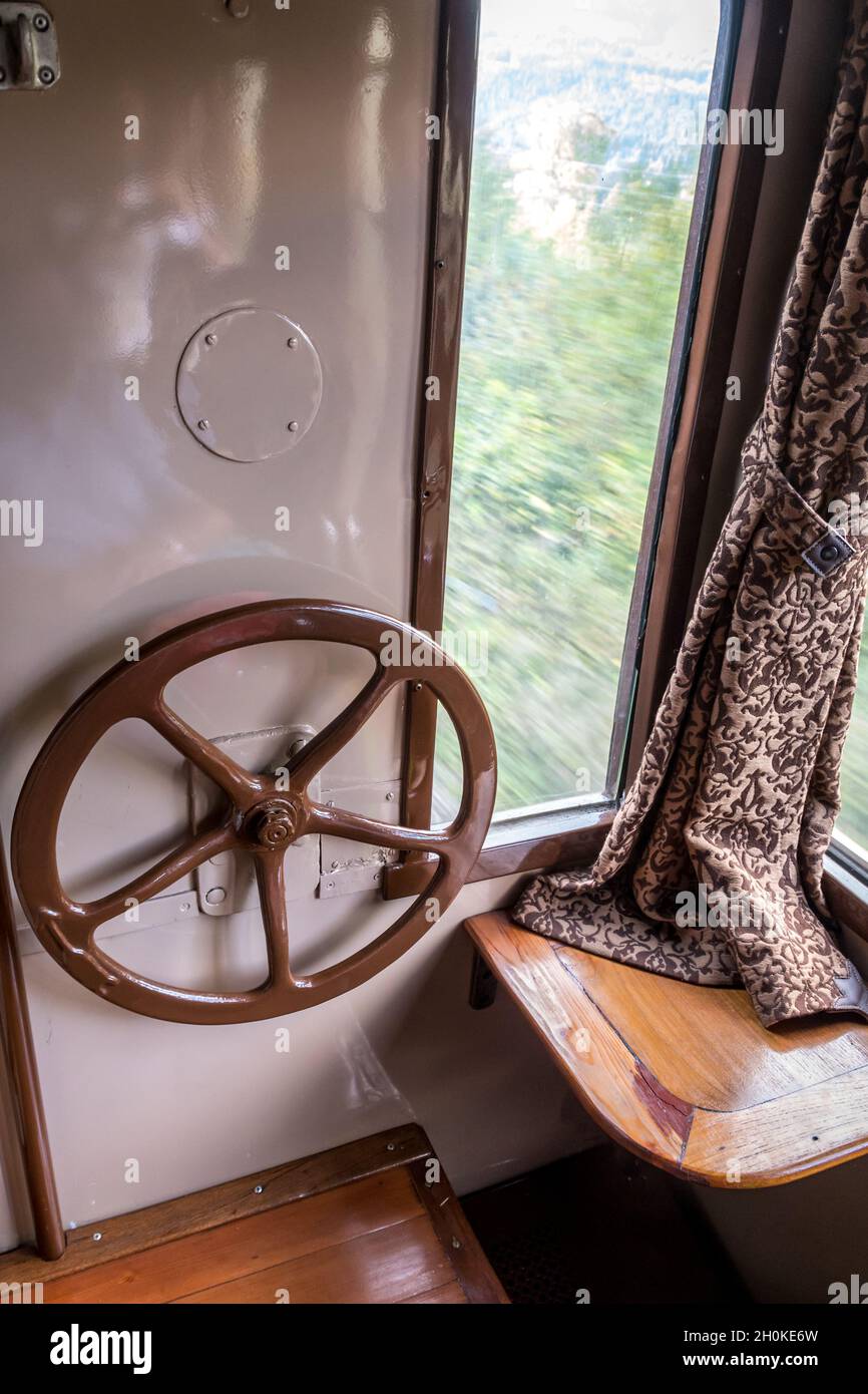 Old fashioned train vagon of a Steam locomotive in the station of ...