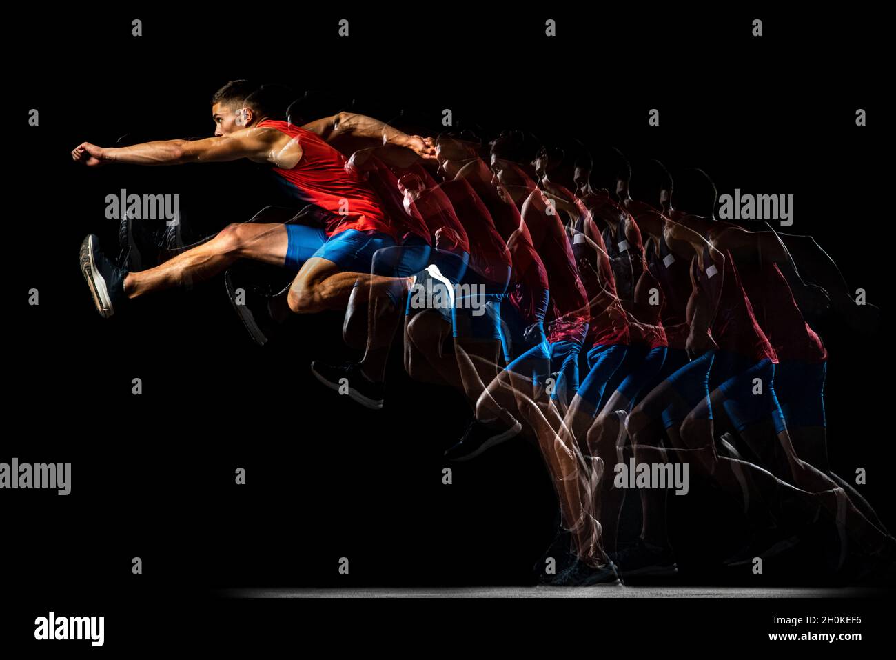 Full-length portrait of young man, professional track athlete, runner ...