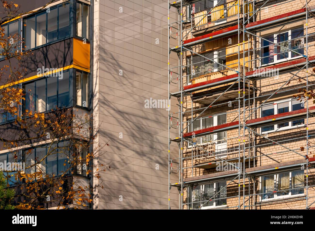 Partly renovated old multistory building. Tall building under ...