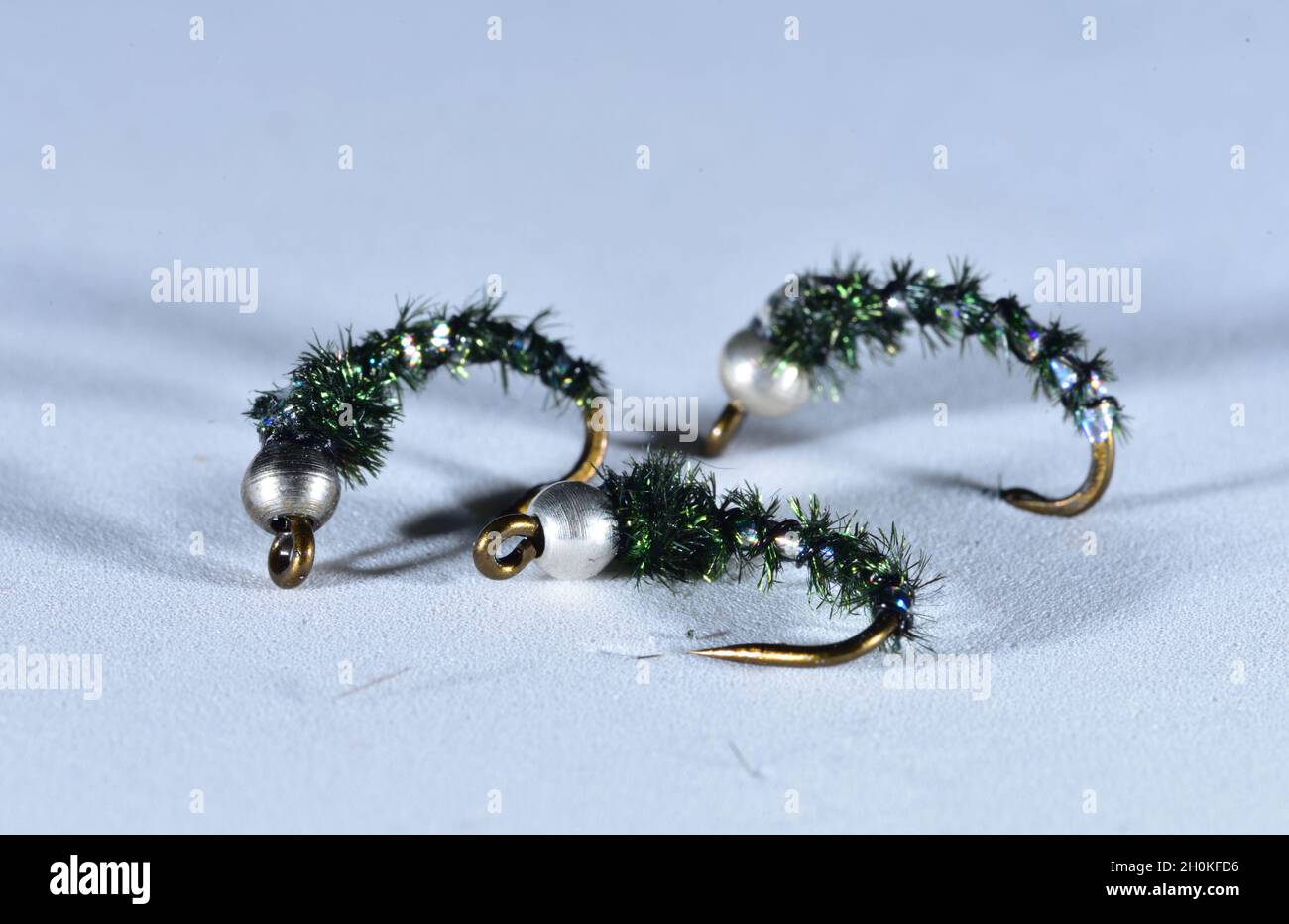 Group of Black midge pupae trout flies Stock Photo - Alamy