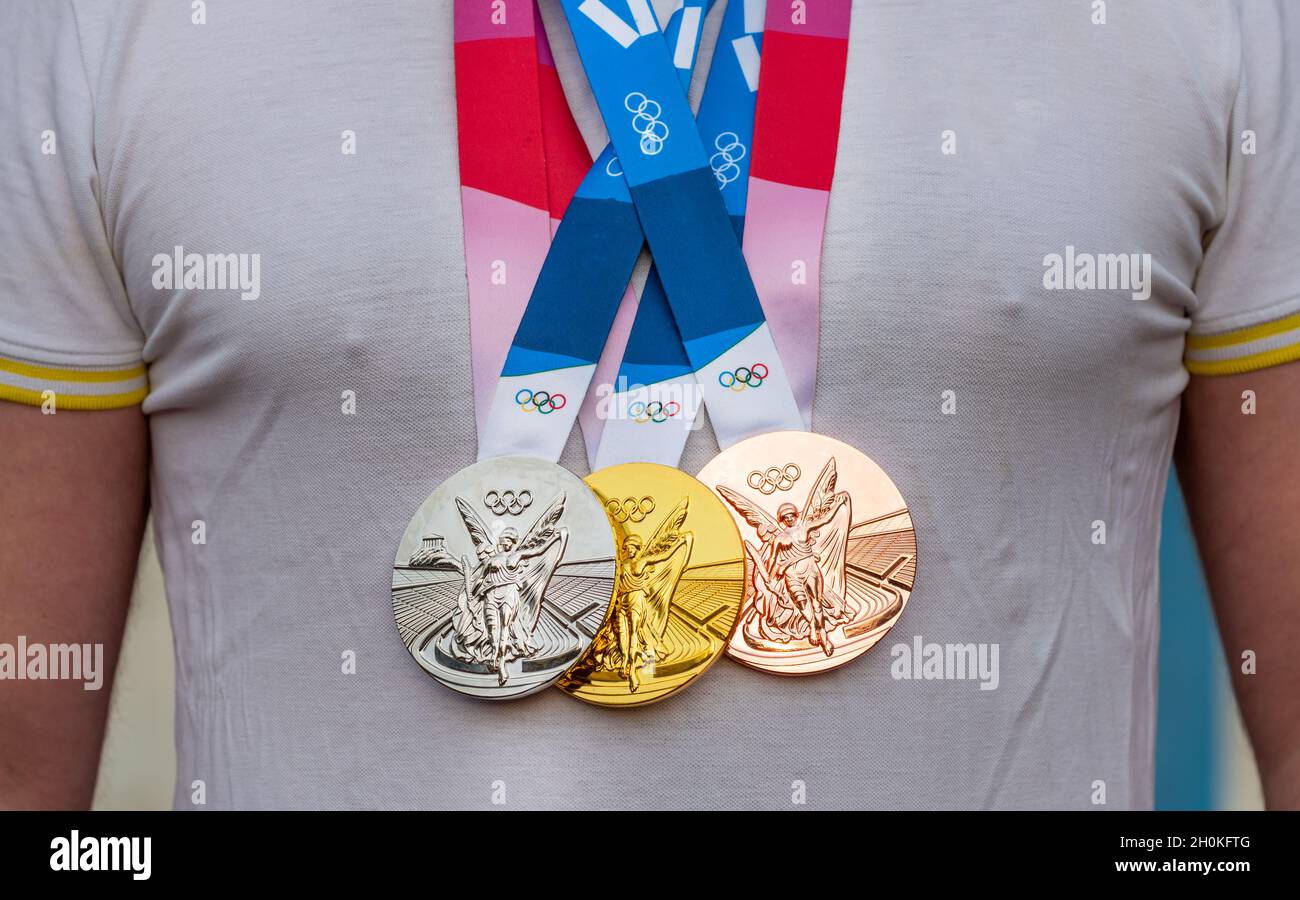 April 17, 2021 Beijing, China. Gold, silver and bronze Olympic medals ...