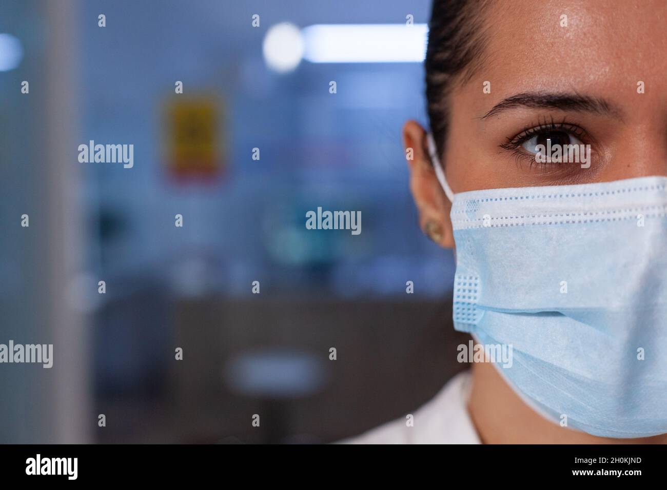 Portrait of practitioner researcher eye looking into camera during ...