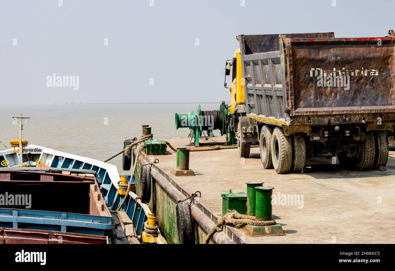 Dhaka, Bangladesh - 13 October 2021: Parked vehicle and boat at old ...