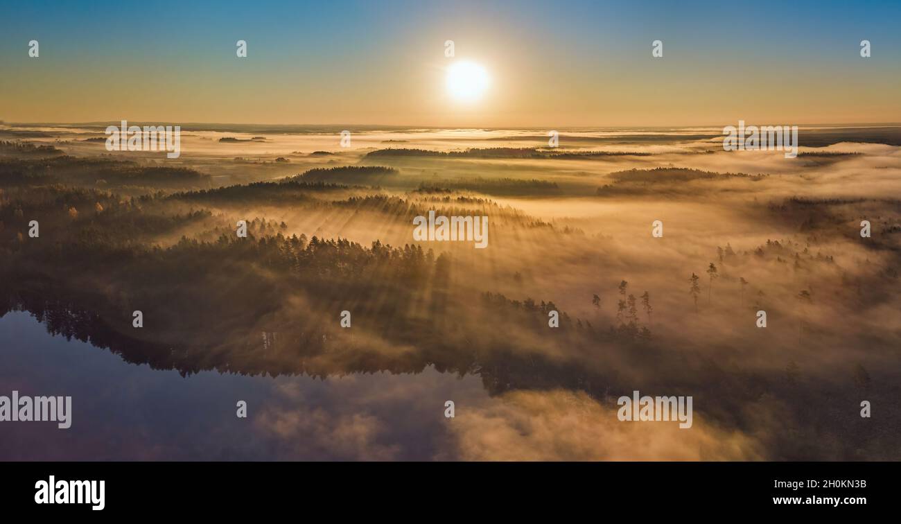 Aerial view of epic light rays over the fields at Autumn Stock Photo ...