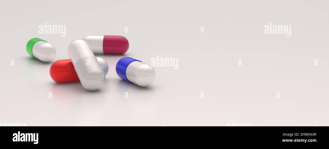 Pills in red blue green color on empty white background. Colorful ...