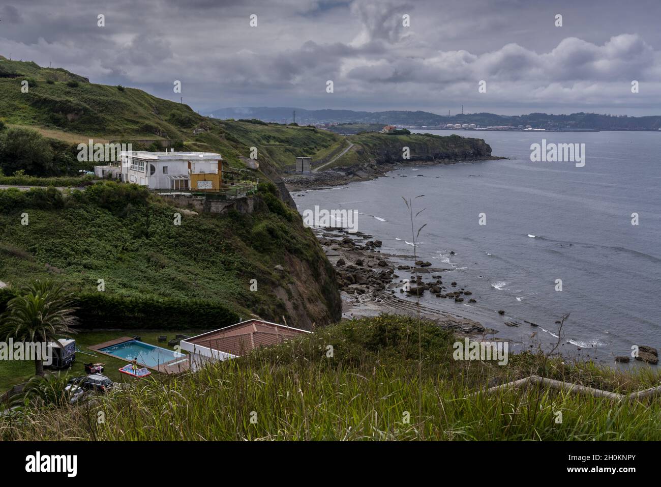 Scenic view Gijon beaches along the Asturias coast under a cloudy sky ...